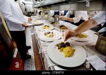 Chef cooking in galley on board a merchant ship Stock Photo - Alamy