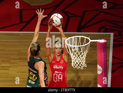 England's Berri Neil takes a shot during the Vitality Netball ...