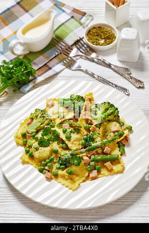 ravioli primavera with green vegetables, broccoli, green peas ...