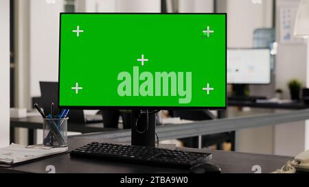 Modern laptop with greenscreen placed on archive desk in police ...