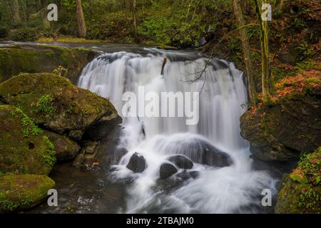 View of a waterfall (Whatcom Creek) from the stone bridge in Whatcom ...