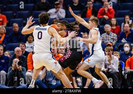 December 5, 2023: Virginia Cavaliers forward Blake Buchanan (0) blocks ...