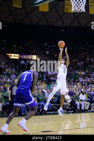 Baylor guard Langston Love shoots against Cincinnati forward Jamille ...