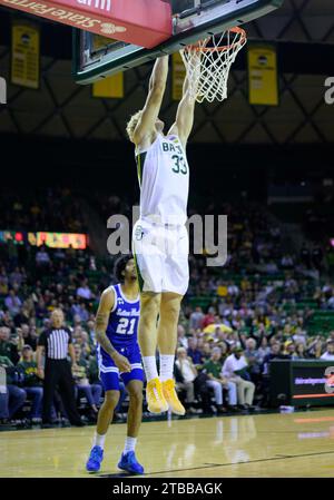Baylor forward Caleb Lohner (33) is fouled by Northwestern State ...