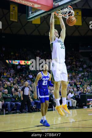 December 5 2023: Baylor Bears forward Caleb Lohner (33) dunks the ball ...