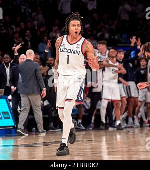 Connecticut Huskies guard Solomon Ball (1) reacts after a three pointer ...