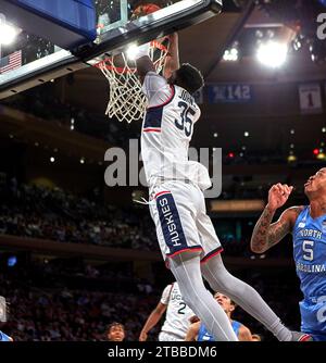 UConn forward Samson Johnson (35) dunks the ball during the first half ...