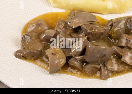 cooked pork kidneys, close-up, accompanied by mash Stock Photo - Alamy