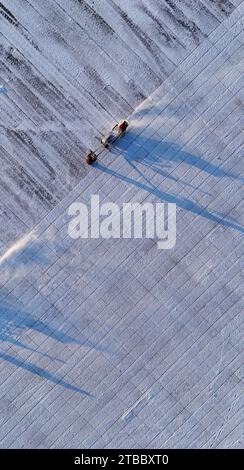 Aerial photo shows workers cutting ice lines to mine ice on Songhua ...