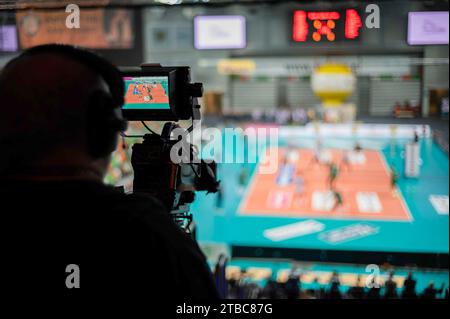 Professional TV camera in sports hall during volleyball match Stock ...