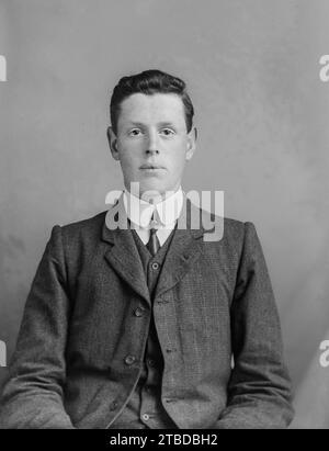 Edwardian formal portrait of a young man in a suit. Taken from a ...