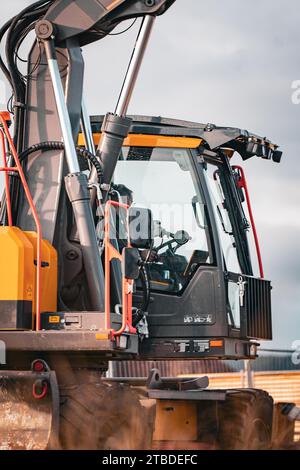 Yellow Volvo tracked excavator on construction site Stock Photo - Alamy