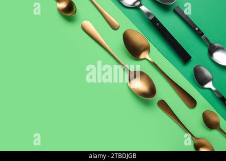 Different stylish silver spoons on white background Stock Photo - Alamy