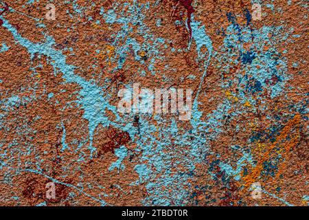 White plastered wall splattered with red paint. Paint splashes on the ...