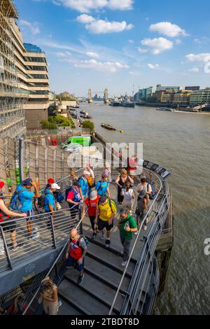 England, Greater London, Southwark. Pedestrians walking past '6 More ...