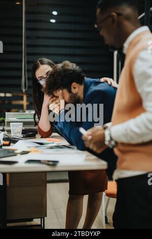 Different aged female employees working together at the office. Senior ...