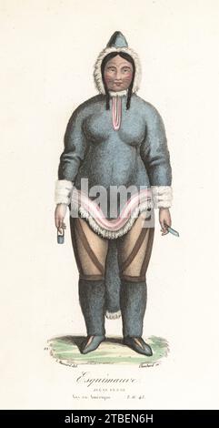 Young Inuit woman of Boothia Peninsula. With tattooed face, in hooded ...