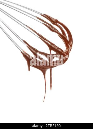 Chocolate cream dripping from whisk isolated on white Stock Photo - Alamy