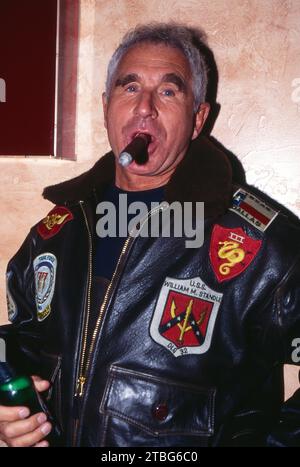Frederic Prinz von Anhalt smoking a cigar and wearing jodphurs and ...