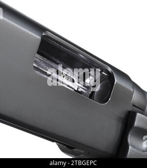 Self-defense shotgun that has been made safe with the empty chamber ...