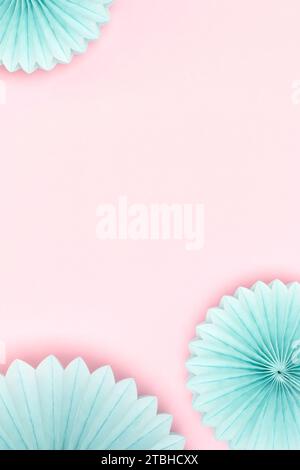 Frame made of tissue paper fans in a pink and blue colors. Gender ...