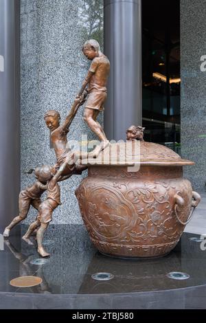 BUDAK-BUDAK is a life-size bronze statue of children playing by Chong ...