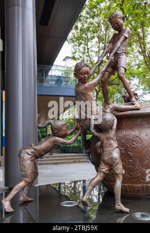 BUDAK-BUDAK is a life-size bronze statue of children playing by Chong ...