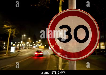 AMSTERDAM - A speed limit sign with a maximum speed of 30 kilometers ...