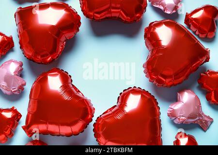 Frame made of heart-shaped balloons on pink background. Valentine's Day ...