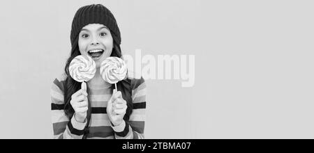 Hipster teenager child girl lick lollypop. Sugar nutrition, candy and ...