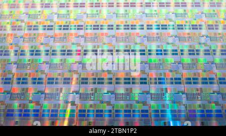 background of silicon wafer semiconductor with neon color, integrated ...