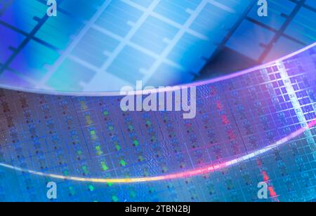 blue Silicon Wafer with microchips used in electronics for the ...