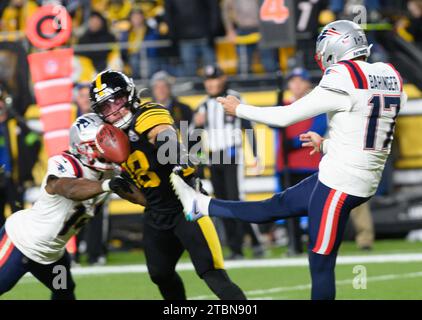 New England Patriots punter Bryce Baringer (17) holds the ball as ...