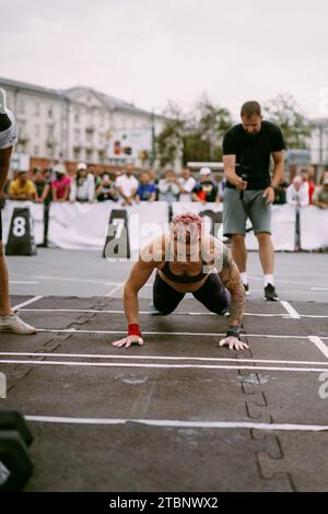 Fit woman doing a burpee exercise. Endurance training. Step by step ...