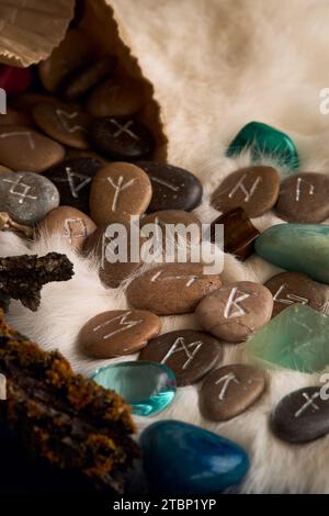 handmade stone runes on white fur Stock Photo - Alamy
