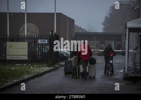 TER APEL - Asylum seekers at the IND gate at the reception center in ...