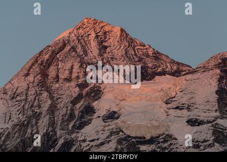 The peaks above Kandersteg at sunset Stock Photo - Alamy