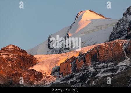 The peaks above Kandersteg at sunset Stock Photo - Alamy