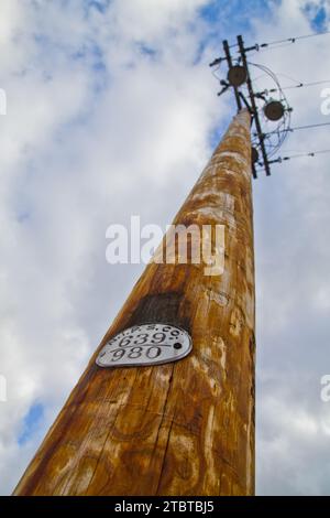 Weathered Utility Pole with Communication Lines Upward Perspective ...