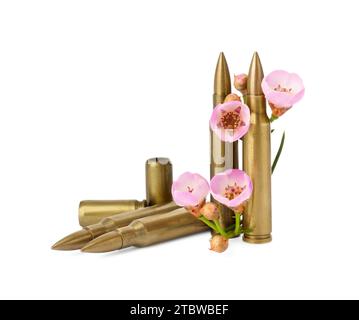 Bullet and cartridge cases with beautiful flowers isolated on white ...