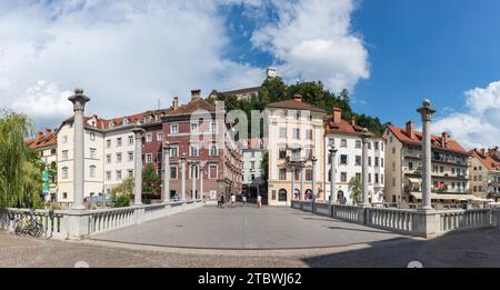 A picture of the Cobblers Bridge overlooked by the Ljubljana Castle ...