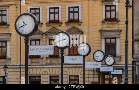 A picture of the city clocks on the Holy Spirit Square Stock Photo - Alamy