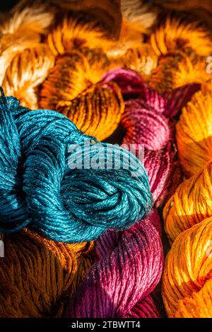 Colorful strands of silk thread close up texture background Stock Photo ...