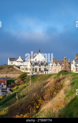 Findochty Moray Firth Scotland a blue sky over the white church on a ...