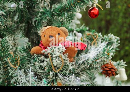 Adorable Squirrel Soft Toy on a Snow Covered Christmas Tree Stock Photo ...