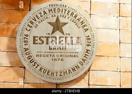 Promotional sign for Estrella Damm beer Stock Photo - Alamy