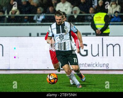 Aalen, Deutschland. 25th Nov, 2023. Dennis Chessa (SSV Ulm 1846, #11 ...