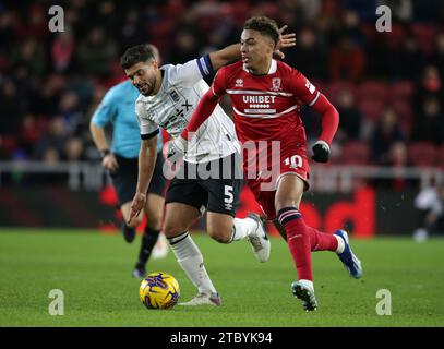 Middlesbrough's Morgan Rogers (right) chased by Ipswich Town's Sam ...