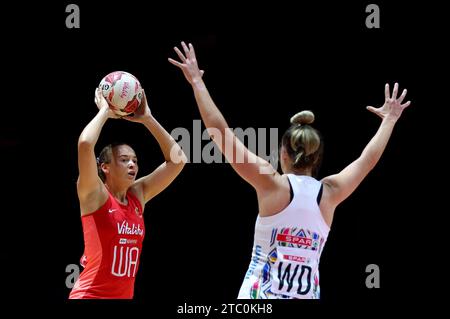 England's Hannah Joseph (left) in action during the Vitality Netball ...