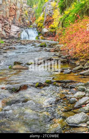waterfall and fall colors along tenderfoot creek in the little belt ...